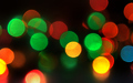 Photo of Christmas background of colorful round lights | Free christmas ...