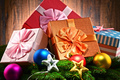 Photo of Colorful Christmas gifts filling a red stocking | Free ...
